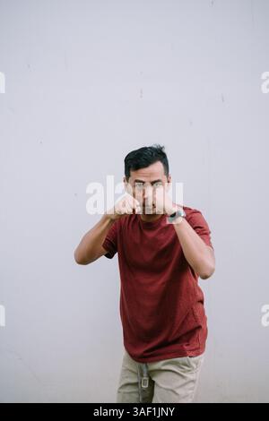 A determined man in a boxing stance, ready for any challenge ...