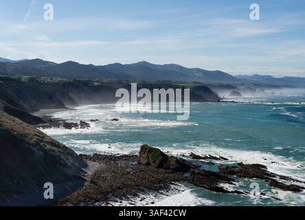 ocean view with fog and swash, spindrift Stock Photo - Alamy