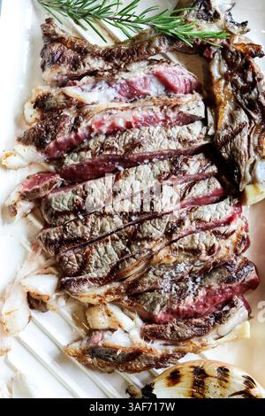 juicy steak with sea salt on the grill Stock Photo - Alamy