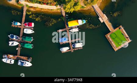 Aerial, top down view of docked boats in a harbour Stock Photo - Alamy
