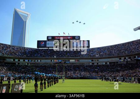 Military jets fly over Charlotte Motor Speedway before the start of the ...