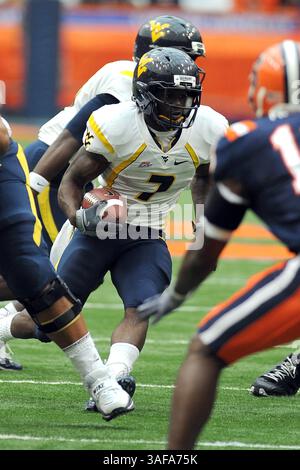 West Virginia running back Noel Devine (7) eludes North Carolina State ...