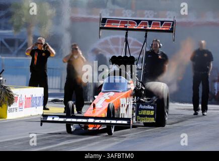 2012 APR 02: NHRA Top Fuel driver Spencer Massey poses with the trophy ...