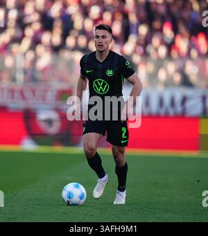 April 06 2025: Kilian Fischer of VfL Wolfsburg looks on during a 1 ...