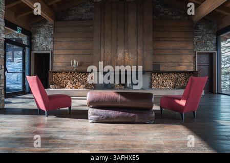 Chic hotel environment with natural light and professional traveler ...