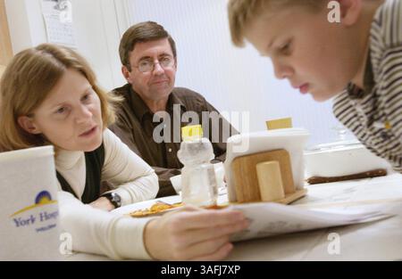Stepfather Steve Martin and his wife, Bonnie Dorr, rush through ...