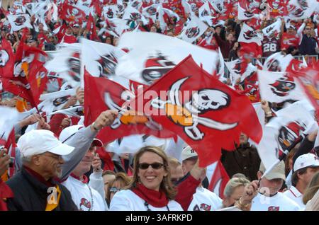 Tampa Bay Buccaneers fans wave flags during a NFL divisional playoff ...