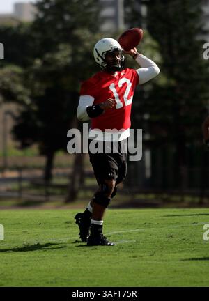 March 20, 2012: Utah State transfer QB Jeremy Higgins #12 runs to get ...