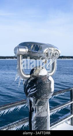 Frozen View Through a Public Telescope Sights Overlooking Icy Lake ...