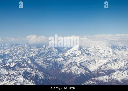Aerial view of Chile's Andes reveals rugged peaks, valleys, and rivers ...
