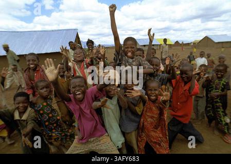 Apr 17, 2003; Kakuma, KENYA; A Bantu child with his family as they make ...