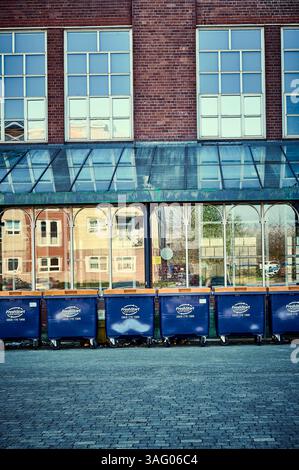 Empty rubbish skips lined up outside Trencherfield Mill in Wigan ,UK ...