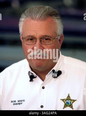 Pasco County Sheriff Bob White presents the..Sheriff's Cross Medal to ...