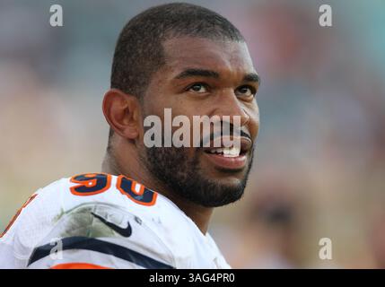 Chicago Bears defensive end Daniel Hardy (92) warms up with teammates ...