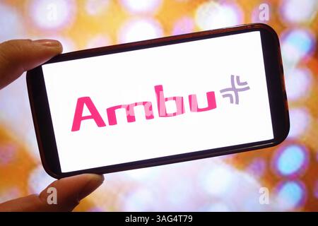 In this photo illustration, the Ambu company logo is seen displayed on ...
