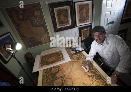 Map artist Christopher Smith poses for portrait in his Leander, Texas ...