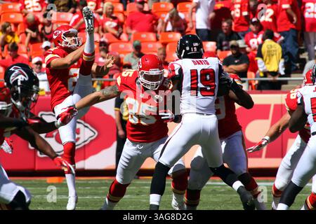 Atlanta Falcons punter Dustin Colquitt (12) punts during the first half ...