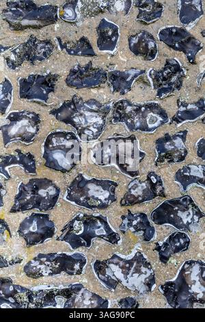 Flint rubble with limestone dressings wall of St Mary's Church, Great ...