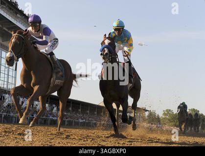 I'll Have Another, left, overtakes Bodemeister at the finish to win the ...
