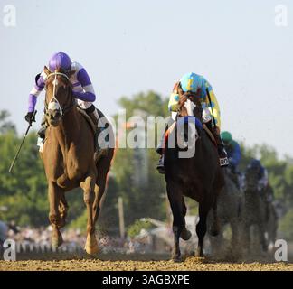 I'll Have Another, left, overtakes Bodemeister at the finish to win the ...