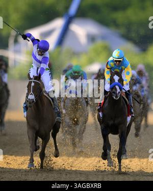 I'll Have Another, left, overtakes Bodemeister at the finish to win the ...