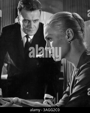 Actors Ingrid Thulin and Gunnar Hellstrom in a scene from the movie The ...