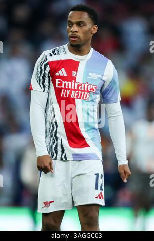 Jurrien Timber of Arsenal warms up ahead of the Premier League match ...