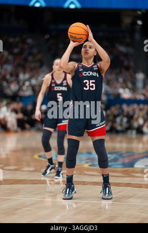 UConn Huskies guard Azzi Fudd (35) takes a selfie with a fan after ...