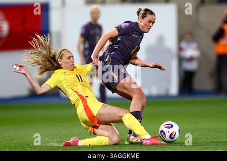 England's Grace Clinton (right) during a training session at ...