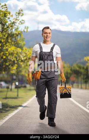 man carpenter holding clipboard at construction site Stock Photo - Alamy