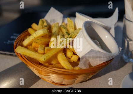 Basket of Fries to share as a snack Stock Photo - Alamy