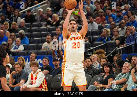 Atlanta Hawks forward Georges Niang (20) shoots against Miami Heat forward Kyle Anderson (20) in ...