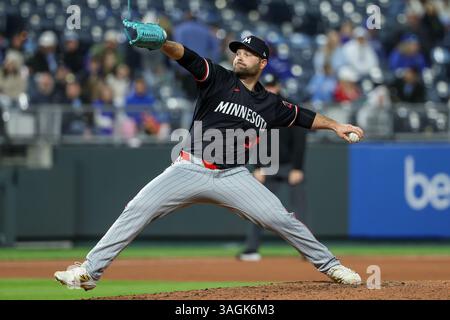 Minnesota Twins pitcher Danny Coulombe (54) delivers during the eighth ...
