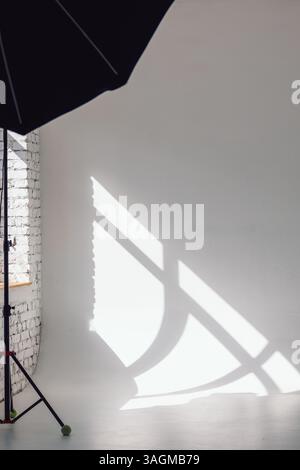 Clear white cyclorama. Light background with with professional lighting ...