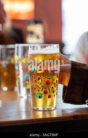 A neck oil session IPA by the Beavertown brewery on a beer mat in a ...