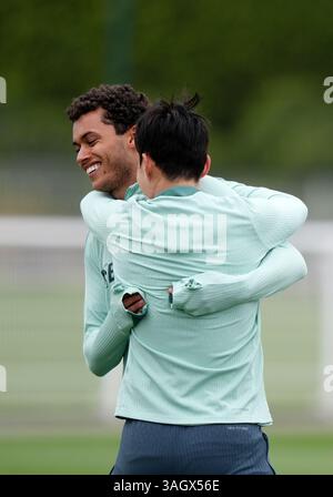 Tottenham Hotspur's Brennan Johnson (left) with his partner Tilde Syah on the pitch after the ...