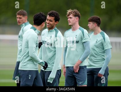 Tottenham Hotspur's Brennan Johnson (right) with his partner Tilde Syah on the pitch after the ...
