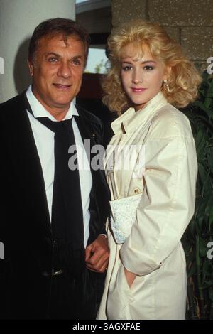 Dec. 00, 1984 - TONY CURTIS WITH WIFE ANDREA SAVIO AND REBECCA HOLDEN ...