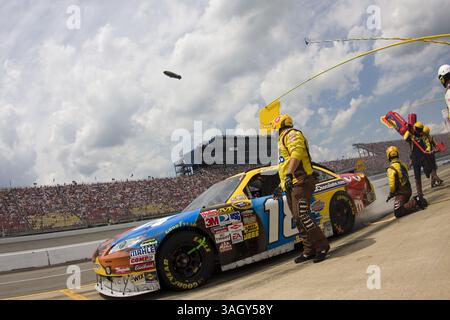 Kyle Busch makes a pit stop during the NASCAR Daytona 500 auto race at ...