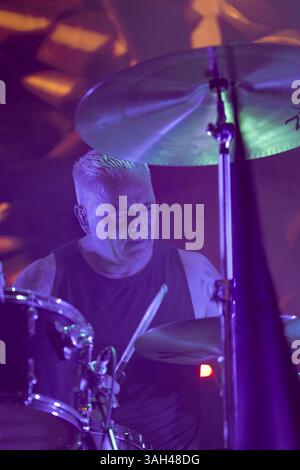 Cambridge, UK, 8 April, 2025. Skunk Anansie in concert. Pictured left ...