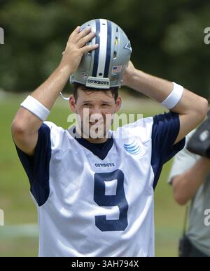 A Dallas Cowboys helmet rests on a Gatorade cooler during an NFL ...