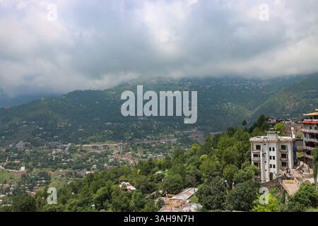 Lush green summer views of Murree, Punjab, Pakistan: houses and ...