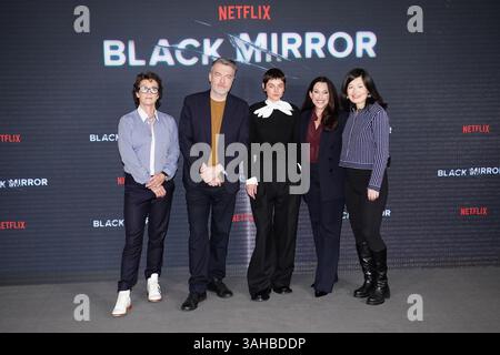 Charlie Brooker, left, and Jessica Rhoades pose for photographers upon ...