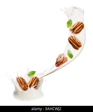 Nut milk splash with pecans and green leaves on white background Stock ...