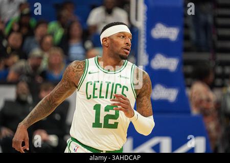 Boston Celtics forward Torrey Craig (12) brings the ball downcourt ...