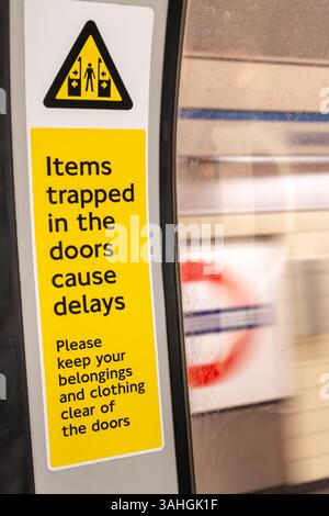 A sign on the London Underground warns passengers to be careful of ...