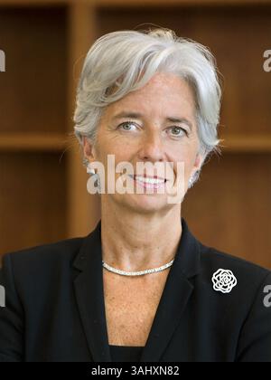 European Central Bank President Christine Lagarde, left, speaks with ...