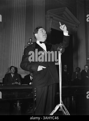 Huey P. Long, politician from Louisiana, is shown speaking to reporters ...