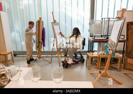 Disabled people drawing at workshop Stock Photo - Alamy