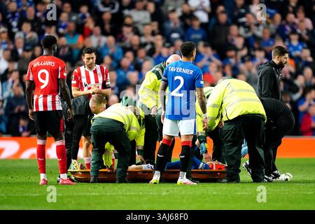Rangers' Bailey Rice is stretched off the pitch following an injury ...